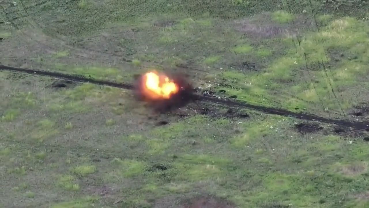 Banknotes spill out of soldier hit by drone #2 • GoreCenter